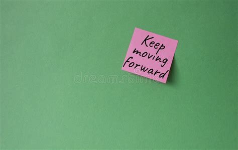 keep moving forward symbol concept words keep moving forward on pink steaky note beautiful
