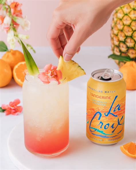 Tangerine Tropical Punch Mocktail The Social Sipper