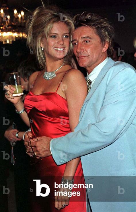 Image Of Singer Rod Stewart Poses With His Wife Model Rachel Hunter