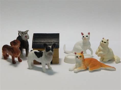 Milka Мілка Собачки Котики брелоки з пластику дерева декоративні 50 грн Витвори