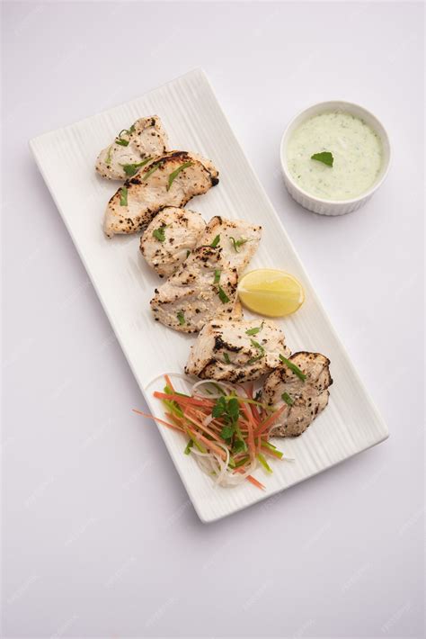 Premium Photo Indian Afghani Chicken Malai Tikka Is A Grilled Murgh