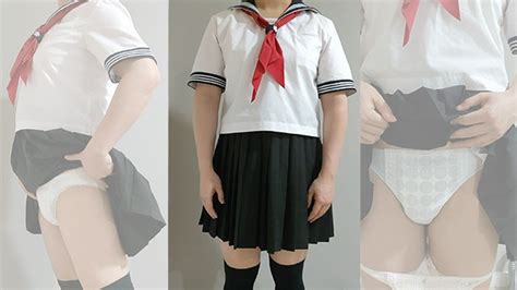 Crossdresser Wearing Sailor Fuku Japanese Uniform And A Pull Up Nappy