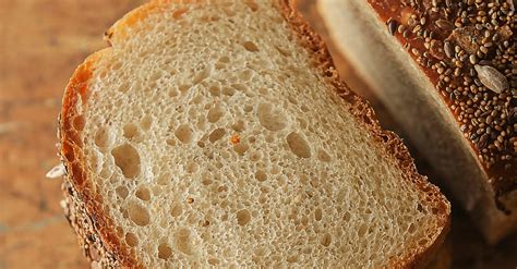 소박한 씨앗 통곡물 빵 슬라이스 · 무료 스톡 사진