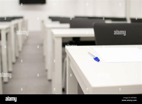 Classroom Empty High School Or University Desk Or Table With A Pen On
