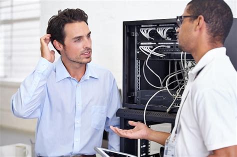 Premium Photo Server Room It Support And Confused With A Technician Explaining To A Business