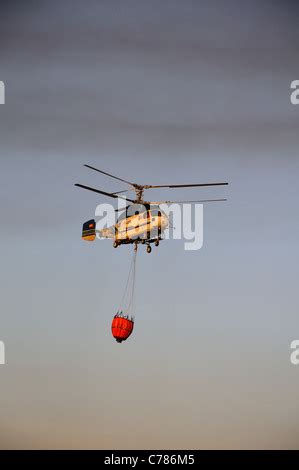 Kamov Ka 32a11bc Helicopter Carrying Water For Fire Cabopino Golf