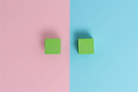 comparison of two objects blocks pencils sticker notes facing inward