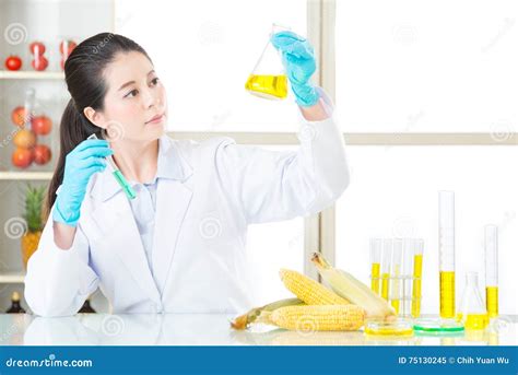 Female Scientist Looking For New Genetic Modification Stock Image