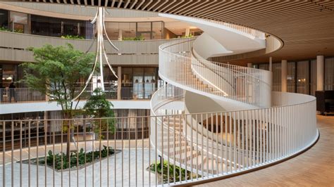 3xn Wraps Spiralling Innovation Hub Around Large Atrium In Stockholm