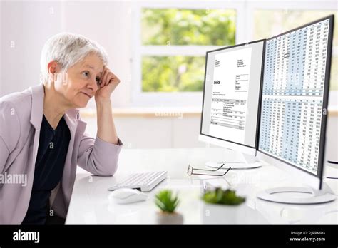 Bored Frustrated Workaholic Female Employee At Desk Stock Photo Alamy