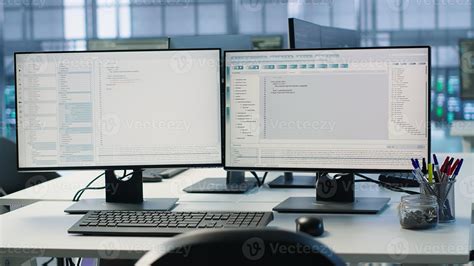 Lines Of Code Running On Computer Screens In Data Center Used For