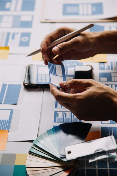 Close Up Ux Developer And Ui Designer Use Augmented Reality Brainstorming About Mobile App