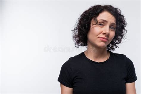 Mature Brunette Woman With Curly Bob Hairstyle Studio Shot Stock Image