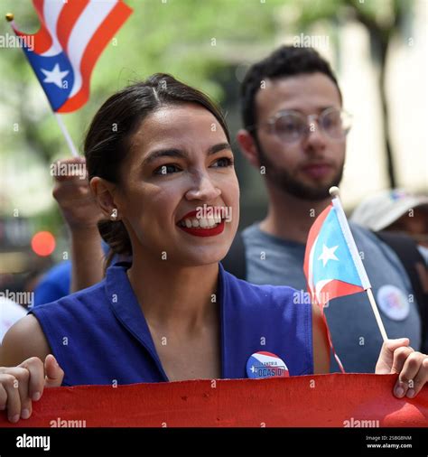 Alexandria Ocasio Cortez Marching In The National Puerto Rican Day