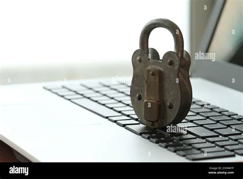 Internet Security Concept Old Padlock And Key On Laptop Computer
