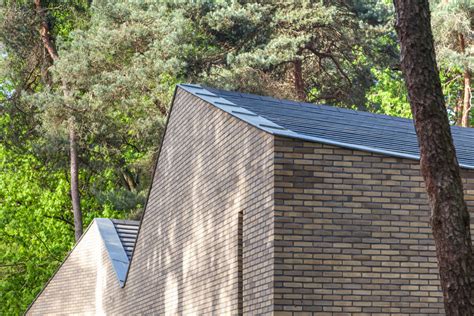 Angular Brick Clad Theatre By Reset Architecture Sits In A Woodland Clearing