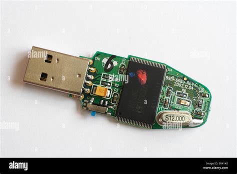 Inside Of USB Memory Stick Showing Components And Circuit Board Data Storage Device Stock Photo