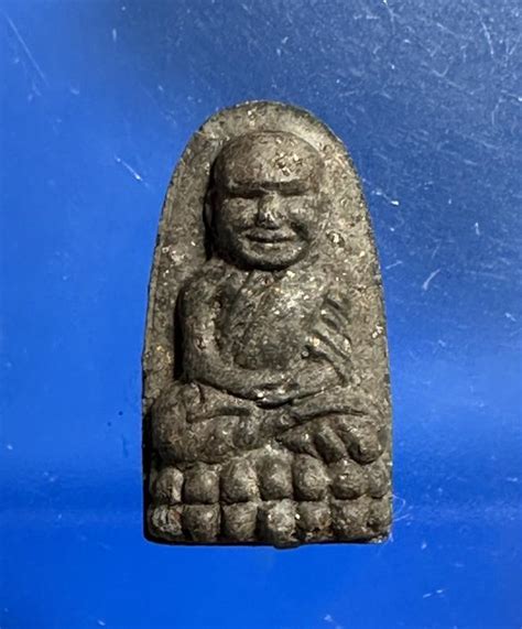 หลวงพ่อทวด เนื้อว่านมงคลผสมผงเหล็กไหล พิมพ์พระรอด วัดห้วยมงคล ประจวบคีรีขันธ์ Ennxo