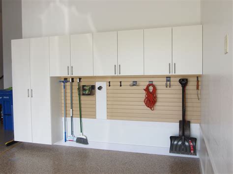Wall Mounted Garage Cabinets And Slatwall In Two Car Garage Garage