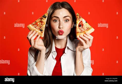 Cute Girl Shows Two Slices Of Delicious Pizza Takeaway Making Kissing