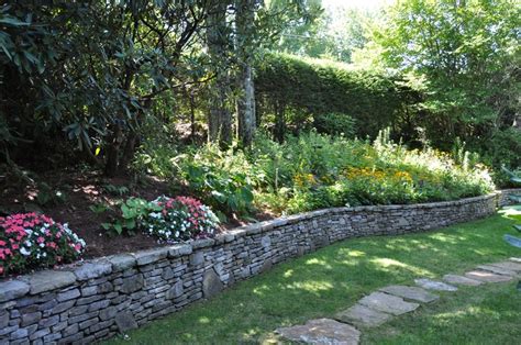 Stone Wall And Flower Garden Design