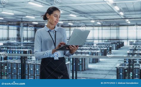 Data Center Engineer Using Laptop Computer Server Farm Cloud Computing Specialist Facility With
