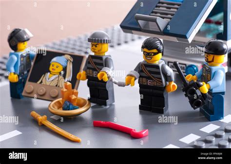 Lego Arrest Two Police Officers And Two Robbers In Handcuffs With Loot