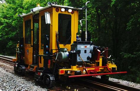 Encore Ride On Tie Plugger Encore Rail Systems Inc