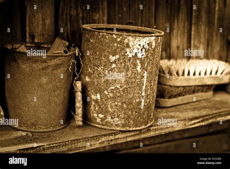 Abstract Vintage Two Rusty Greasy Cans On Wooden Shelf Stock Photo Alamy