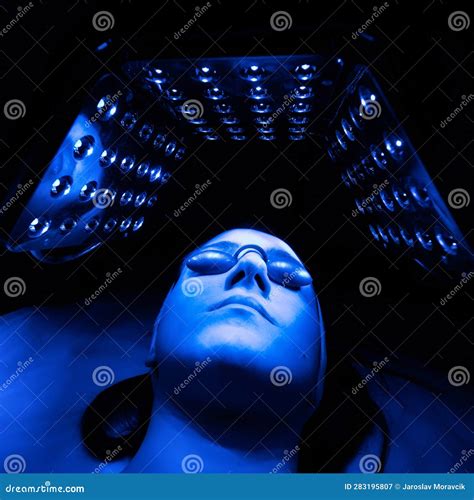 Young Woman Having LED Light Facial Treatment in Beauty Salon Stock ...