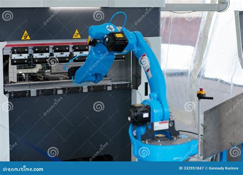 Sheet Metal Bending Machine And Industrial Robot Stock Image Image Of