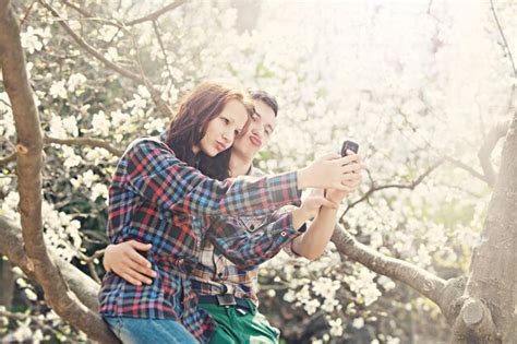 Premium Photo Young Couple Doing Selfie