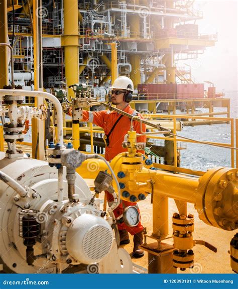 Operator Recording Operation Of Oil And Gas Process At Oil And Rig