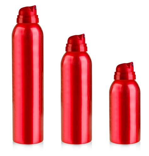 Premium Photo Set Of Red Cosmetic Spray Bottles Isolated On White