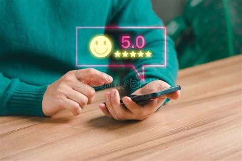 Man Customer Using A Mobile Phone Or Smartphone In Give Rating To