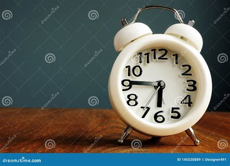 Procrastination And Time Management Concept Alarm Clock On A Table Stock Image Image Of