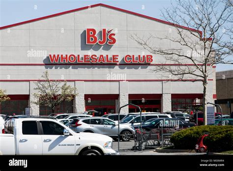A Logo Sign Outside Of A Bjs Wholesale Club Retail Store Location In