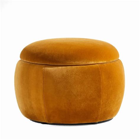 hide away your overflow of throws in the best storage ottomans round