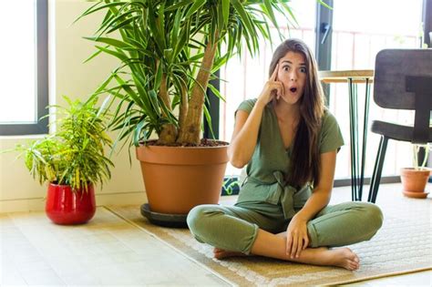 Premium Photo Pretty Woman Looking Surprised