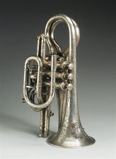 An Engraved Decorated Clear Bore Patent Four Valve Presentation Silver Plated Cornet Brass
