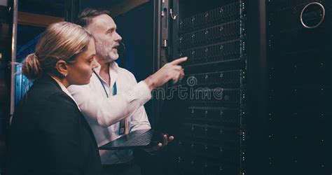 Server Room Man And Woman Or Laptop With Communication Pointing And Information Technology