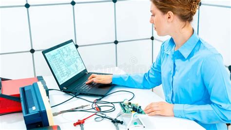 Young Female Student In The Laboratory Of Microelectronics Stock Image