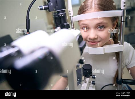 Smiling Girl Is Undergoing An Ophthalmic Examination On Special