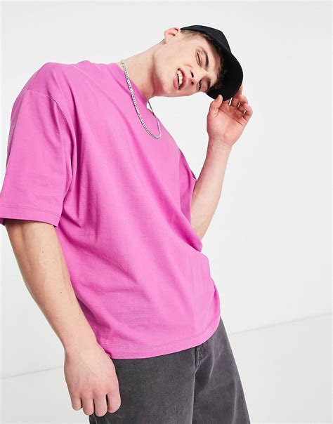 Розовая футболка оверсайз с мультяшным принтом на спине ASOS DESIGN ...