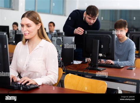 Teacher Conducts Computer Science Exam In University Class Stock Photo Alamy