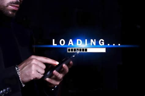 premium photo businessman with smartphone displaying loading screen