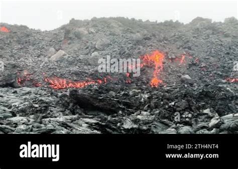 Panorama Of Steaming Black Lava Rocks Red Hot Molten Lava Flowing Through Streams On Slope