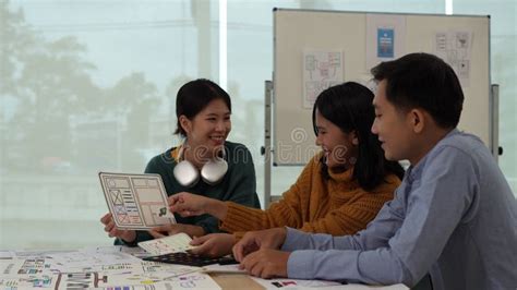 Team Of Ux Developer And Ui Designer Brainstorming Interface Wireframe Designcreative Digital