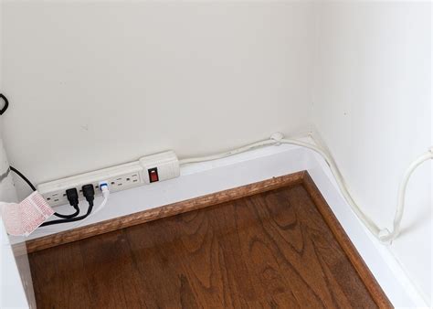 How To Hide Cords Without Drilling Through The Wall Hide Cords Hide Electrical Cords Hide