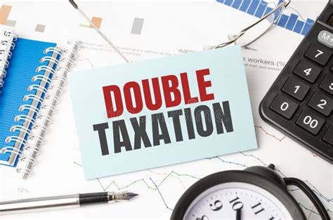 Double Taxation Words On Charts With Alarm Clock And Calculator Stock Image Image Of Number